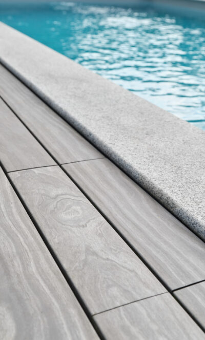 Comparing Pool Decking Materials: Pros & Cons
